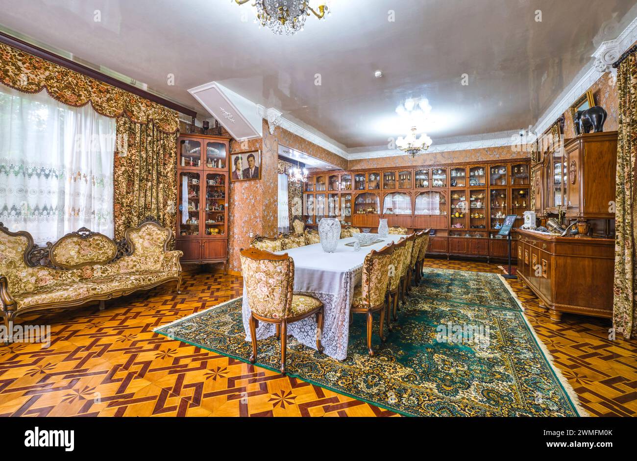 Interior view of the large dining room with walls of china cabinets. At ...