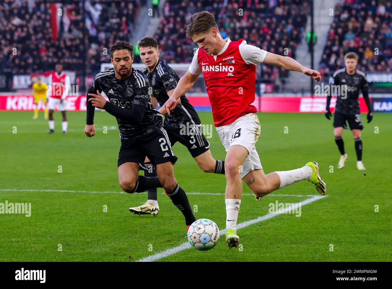 ALKMAAR, NETHERLANDS - FEBRUARY 25: Devyne Rensch (Ajax) and David ...