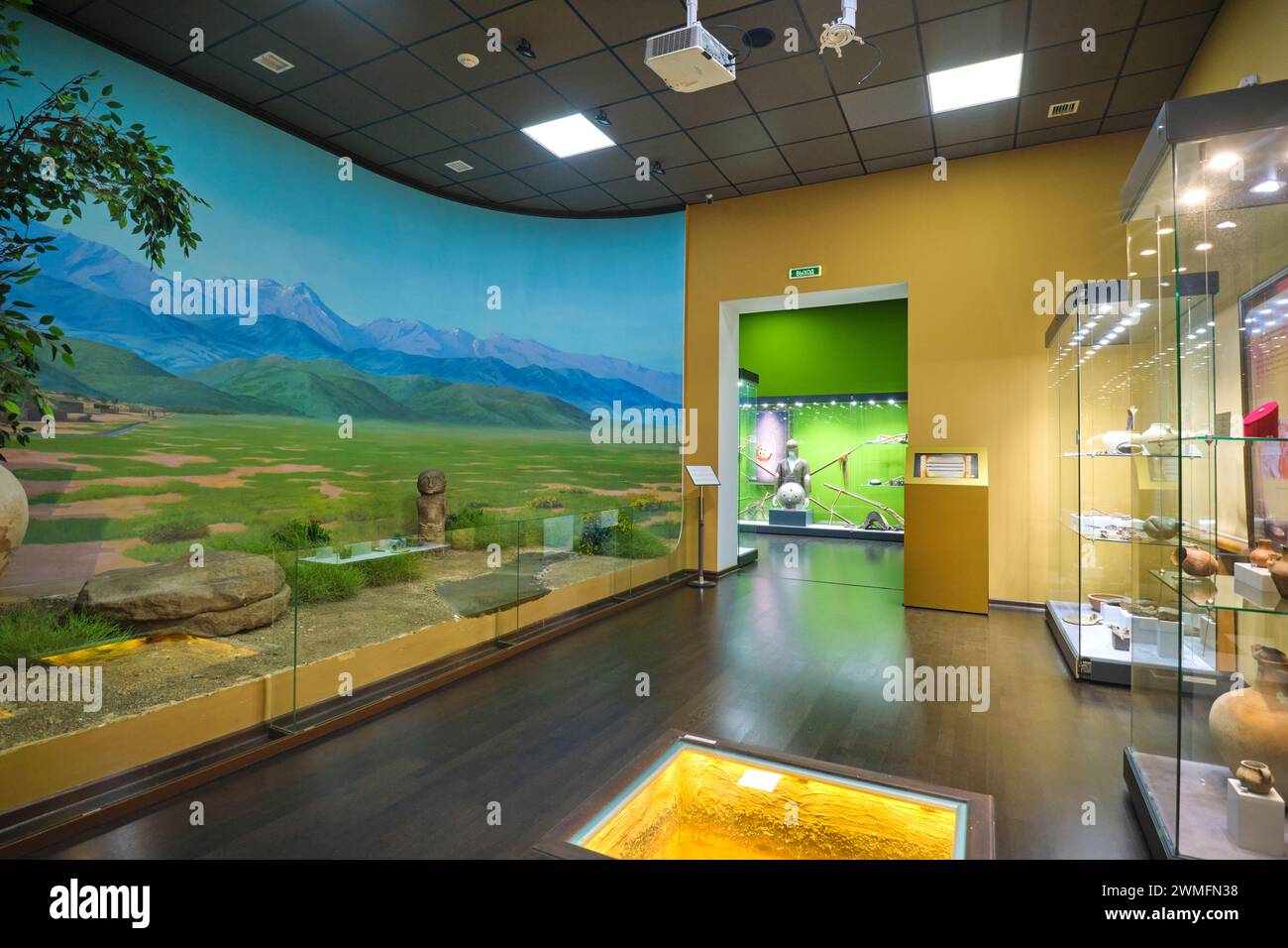 View of a gallery room featuring ancient exhibits of pottery, stone ...