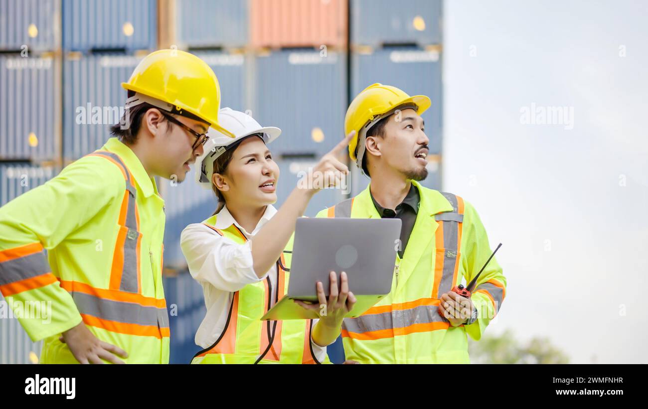 The dock workers receive instructions from the supervisor. Thailand ...