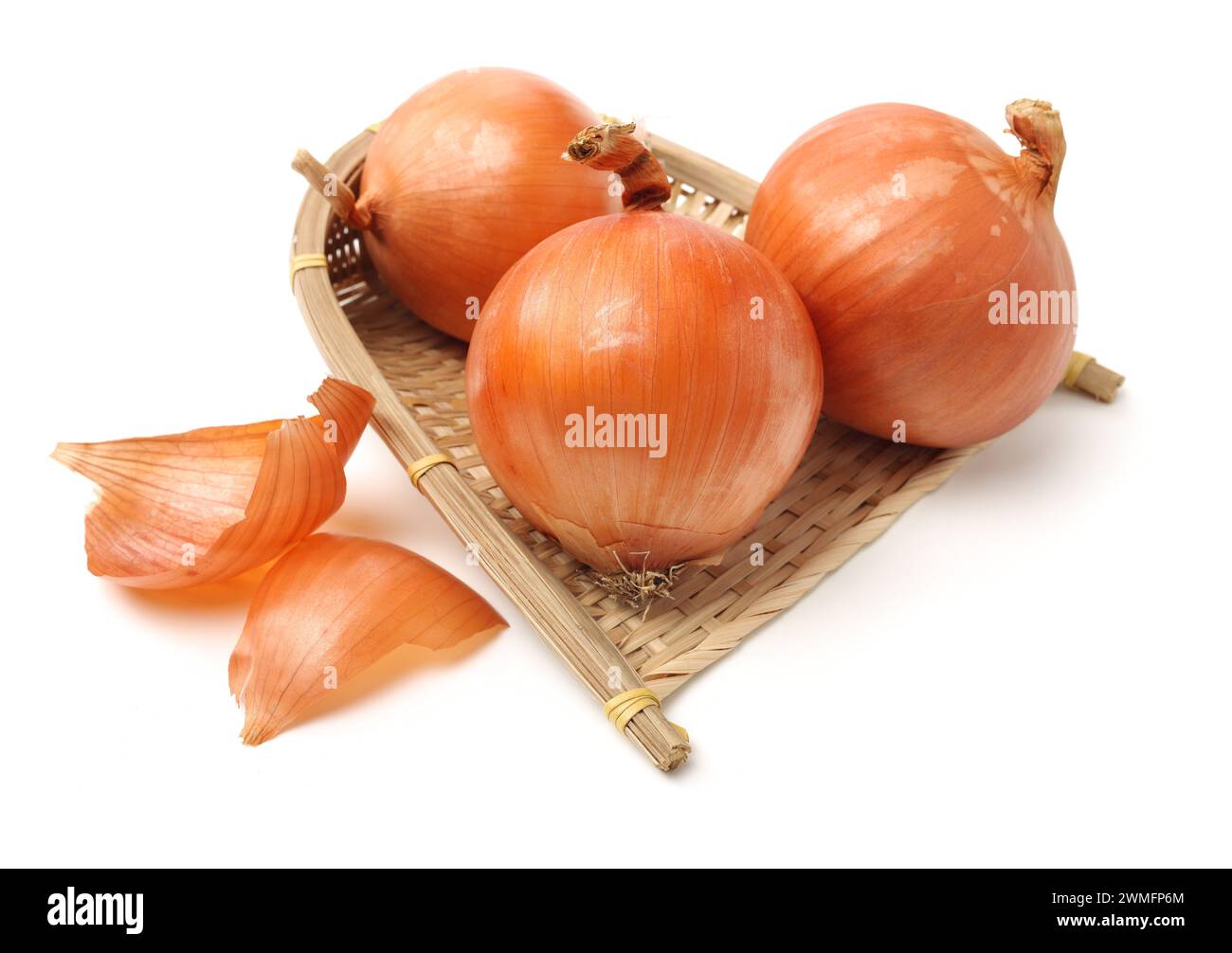 Gold onion vegetable bulbs on white background Stock Photo - Alamy