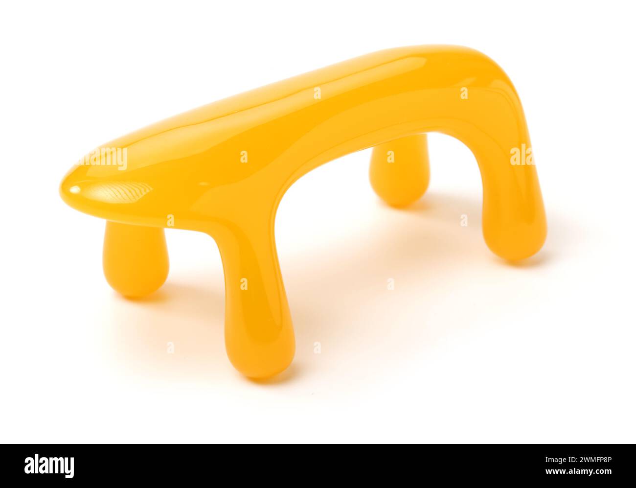 Plastic massage tool isolated on white background Stock Photo - Alamy