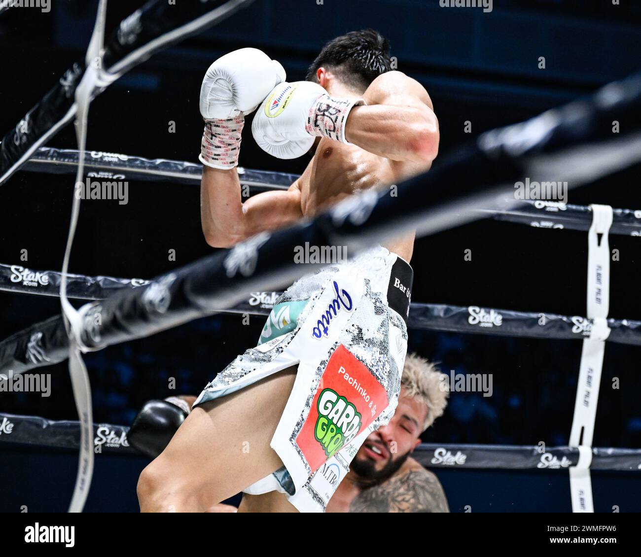 Champion Alexandro Santiago (black gloves) of Mexico and challenger ...