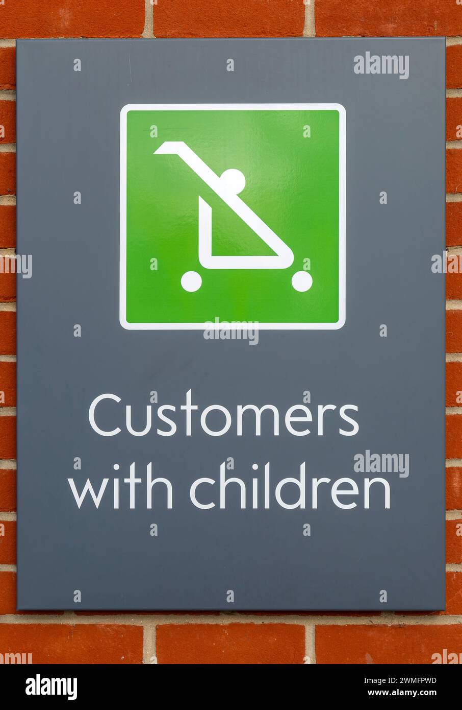 Waitrose parking sign for customers with children, UK Stock Photo - Alamy