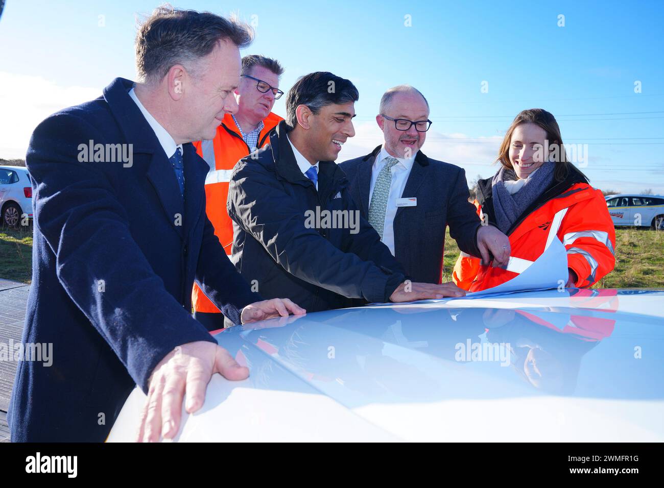 Britain's Prime Minister Rishi Sunak, third left, Julian Sturdy ...