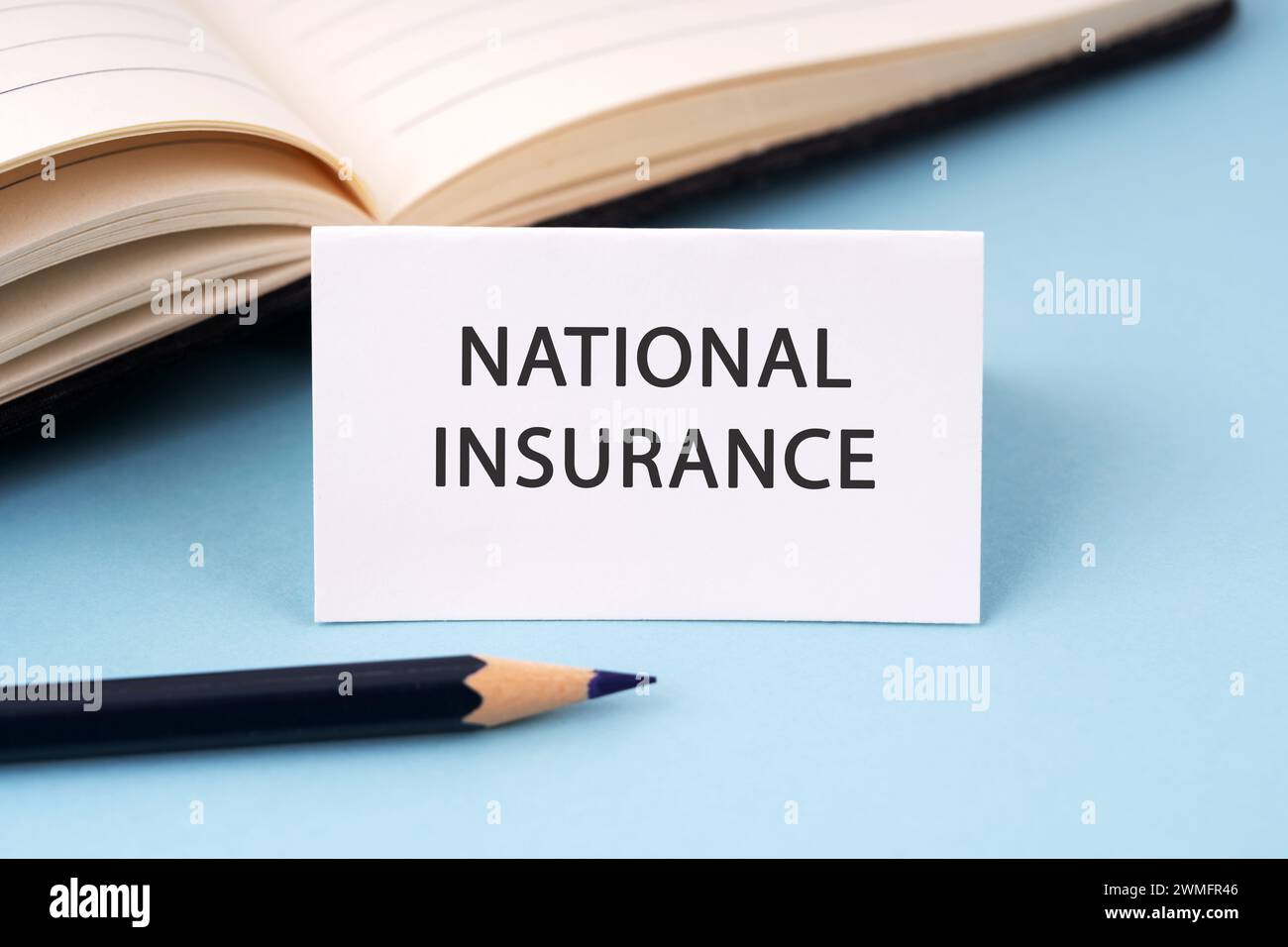 Paper note with text National Insurance Stock Photo - Alamy