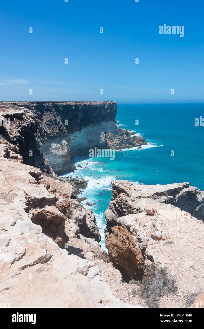 Vertical view of crumbling cliffs due to coastal erosion, Great ...