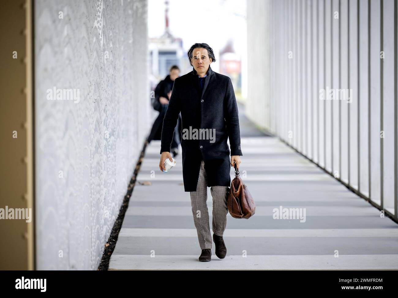 BADHOEVEDORP - Lawyer Guy Weski arrives at the Schiphol Judicial ...