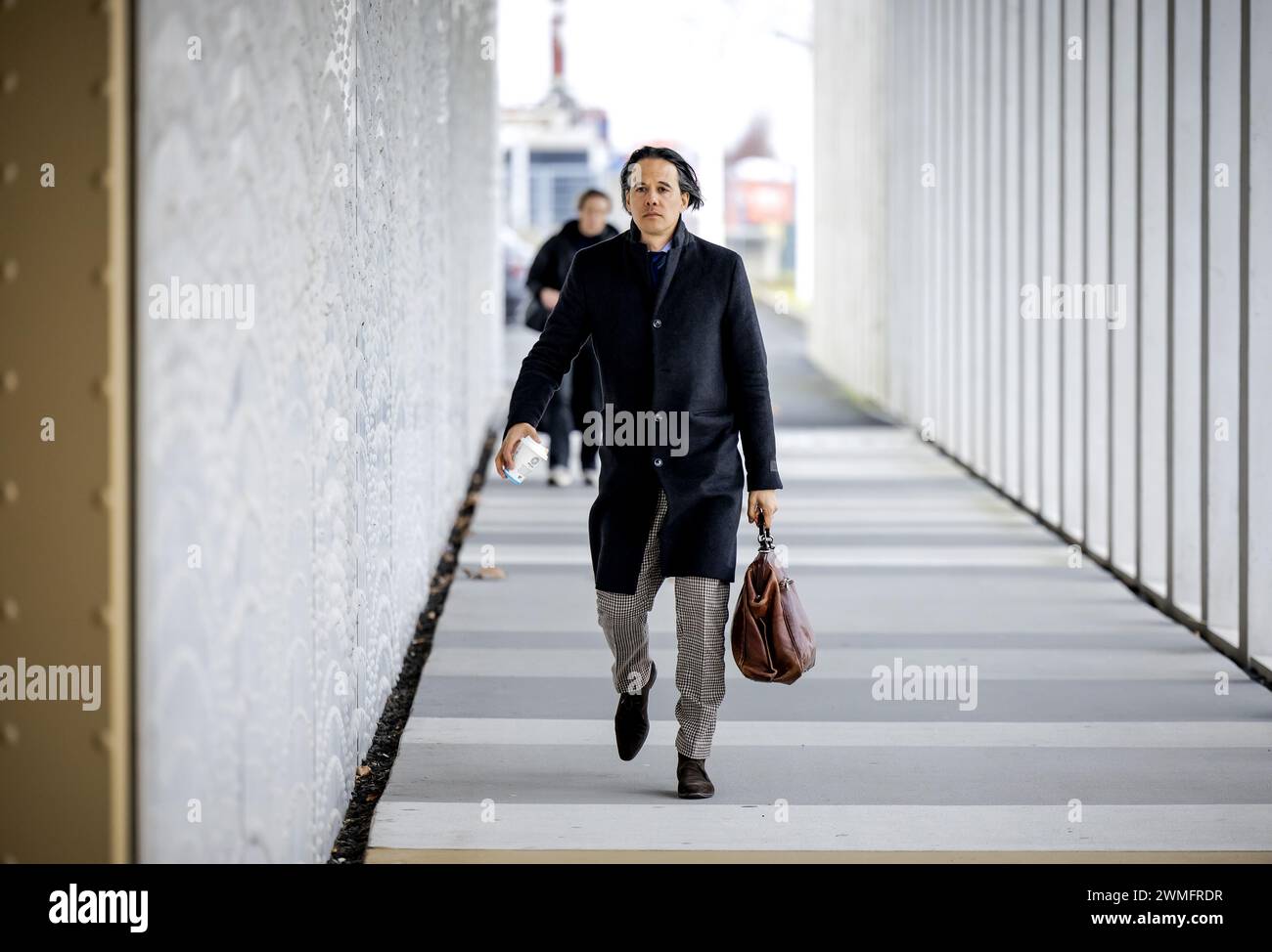 BADHOEVEDORP - Lawyer Guy Weski arrives at the Schiphol Judicial ...