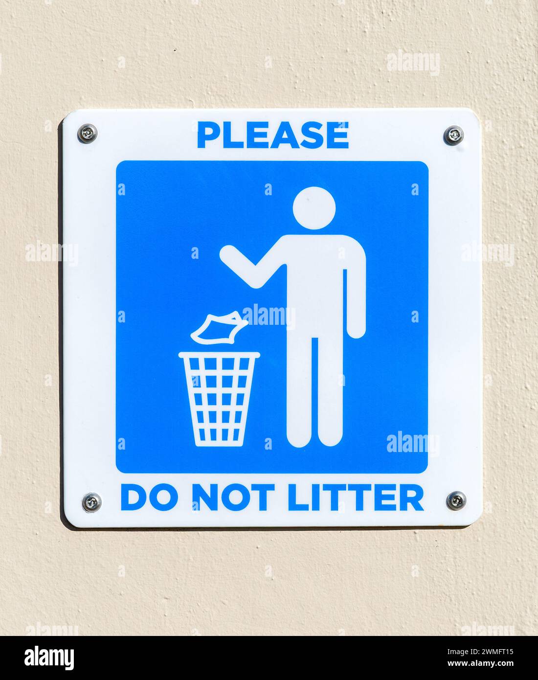 Please do not litter sign white cut-out figure on blue background, UK ...