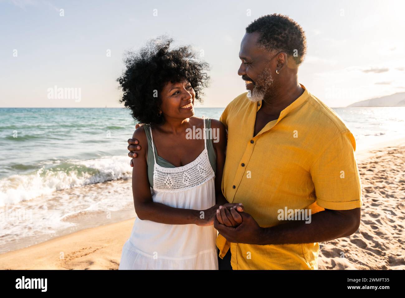 Beautiful mature black couple of lovers dating at the seaside - Married ...