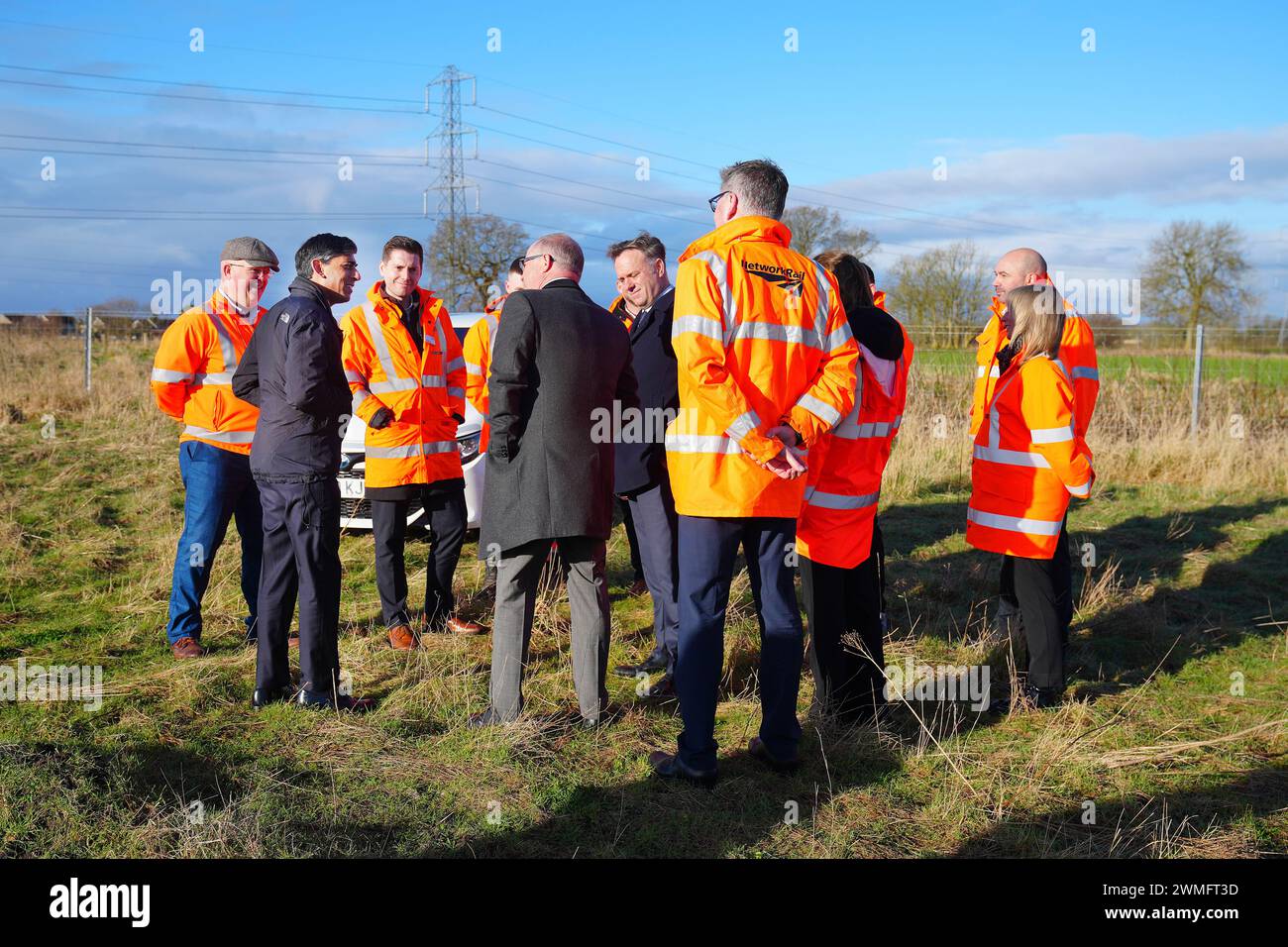 Prime Minister Rishi Sunak (left) speaks to Network Rail employees as ...