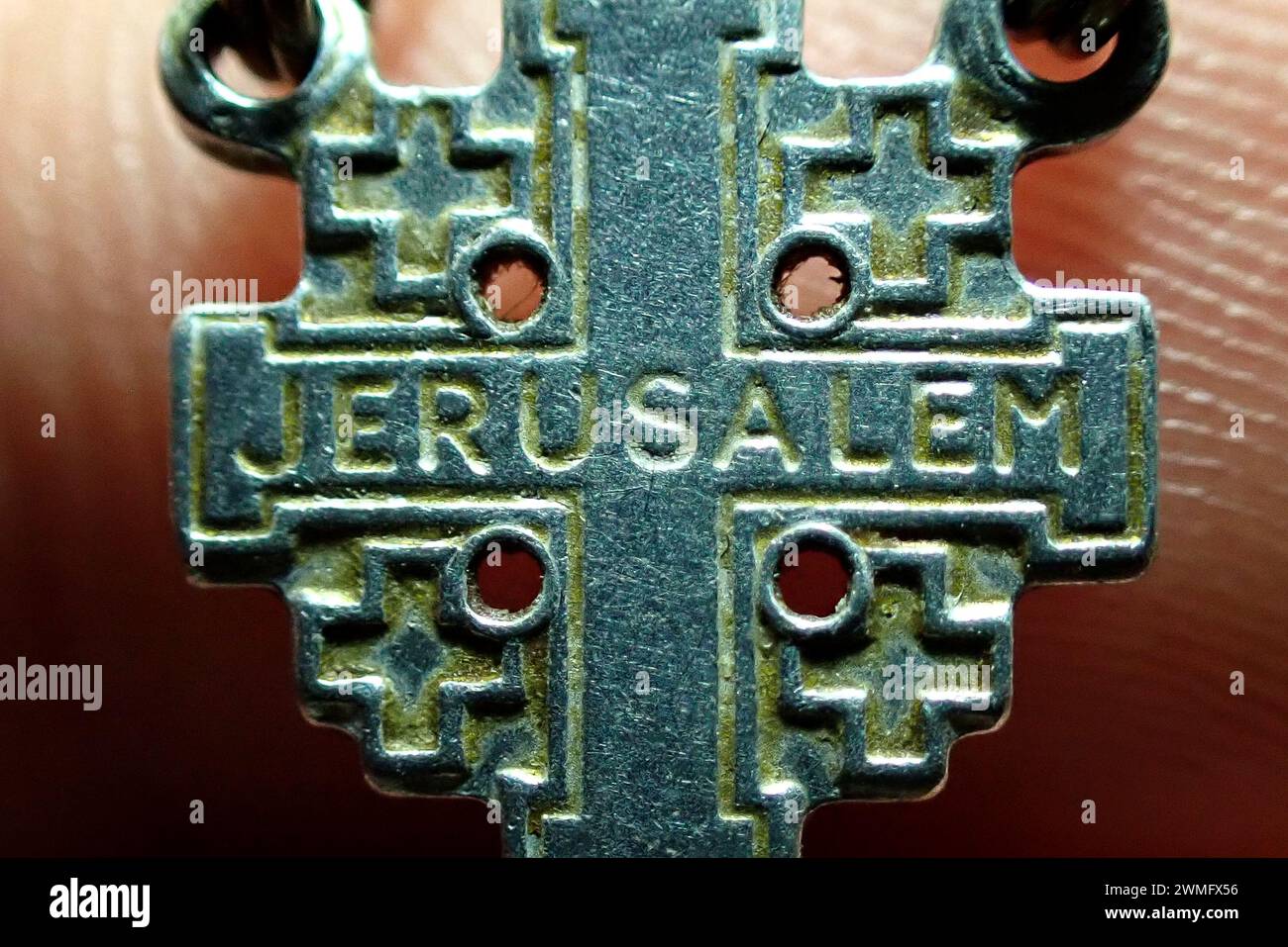 Macro view of the Celtic cross of Jerusalem, depicting a central cross ...