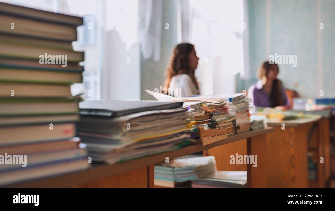 Stacks of books and notebooks in the school's teacher's lounge Stock ...