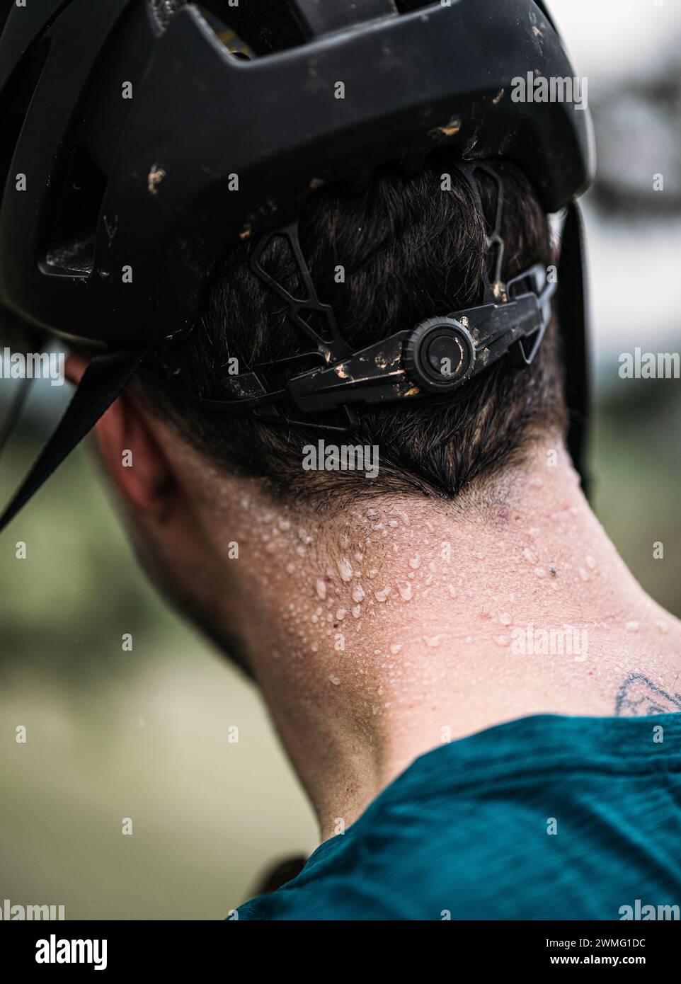 Sweat droplets form on the neck of cyclist wearing helmet Stock Photo ...