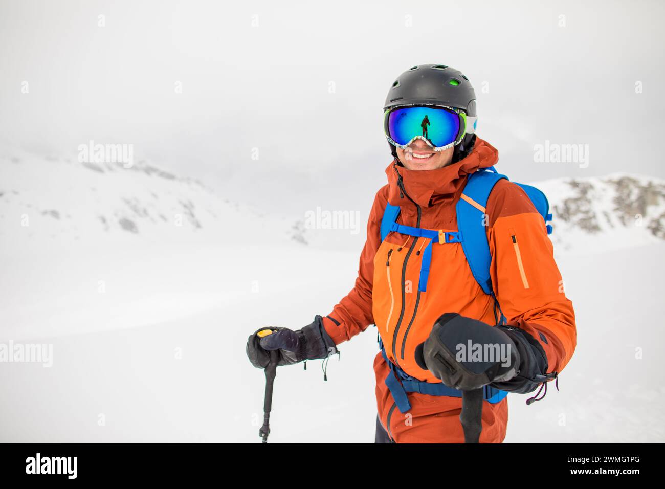 Portrait skier in orange hi-res stock photography and images - Alamy