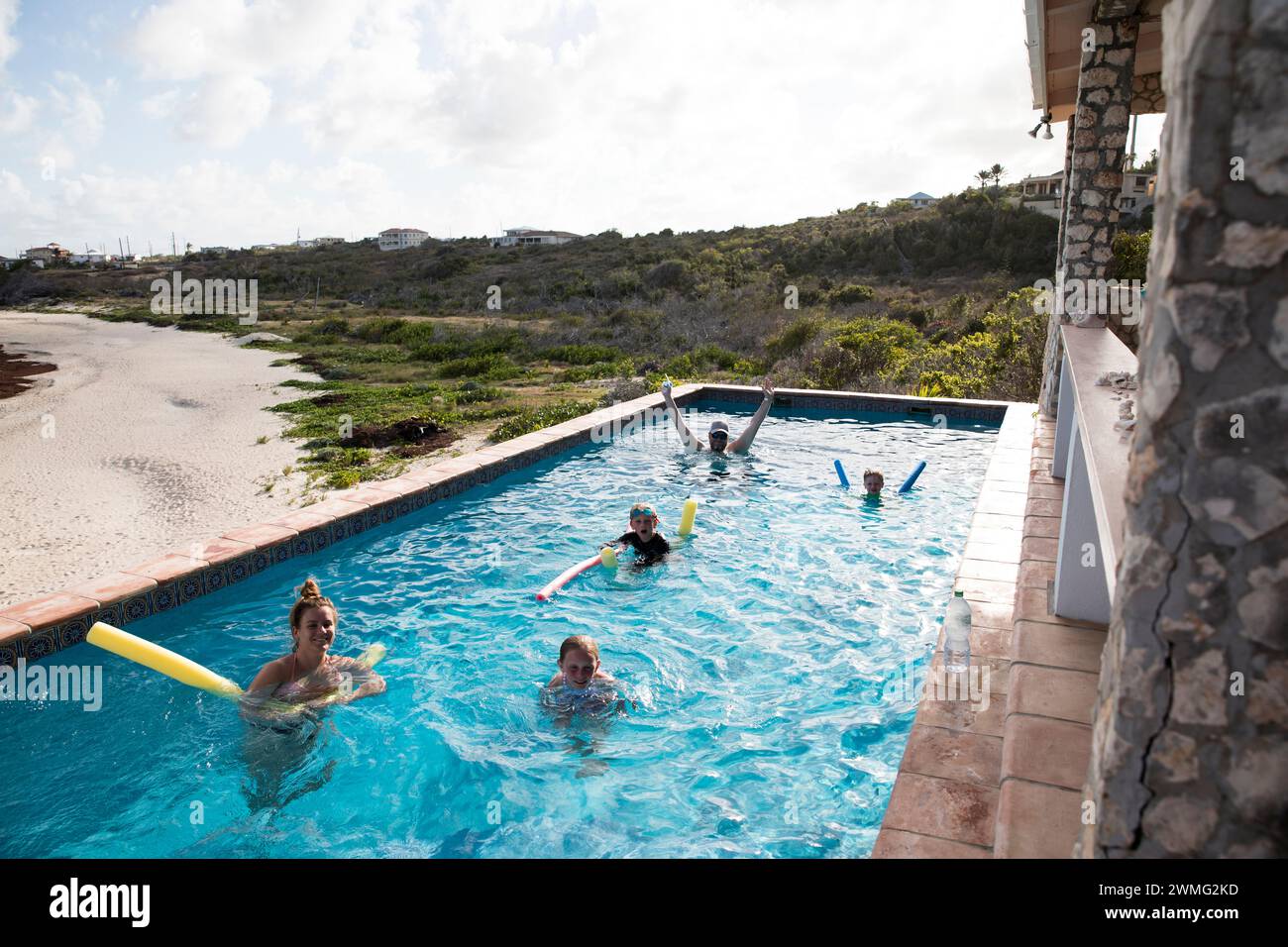Large Happy Family in Infinity Pool on Caribbean Vacation Stock Photo ...