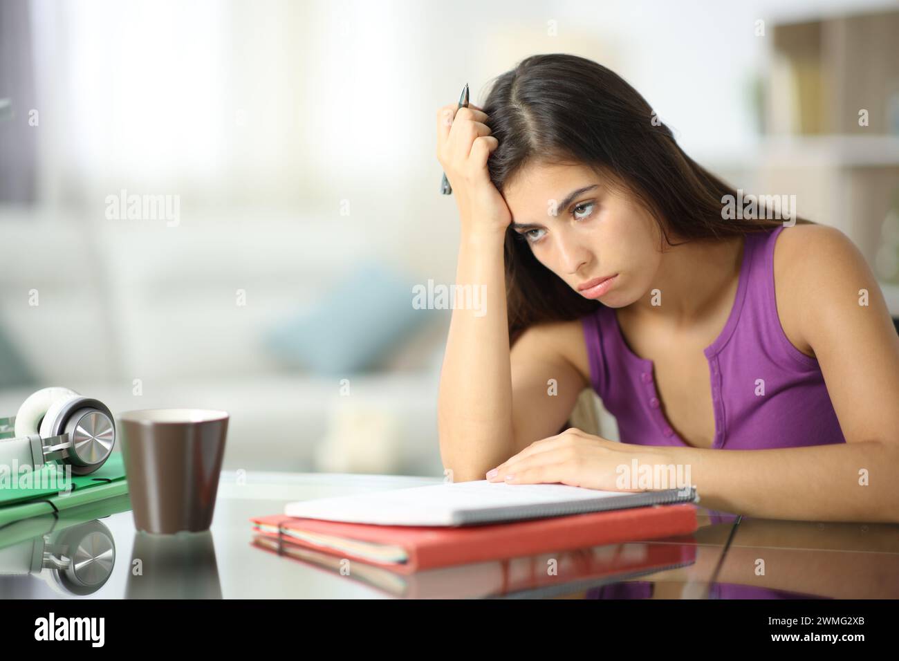 Frustrated student boring and complaining at home Stock Photo - Alamy