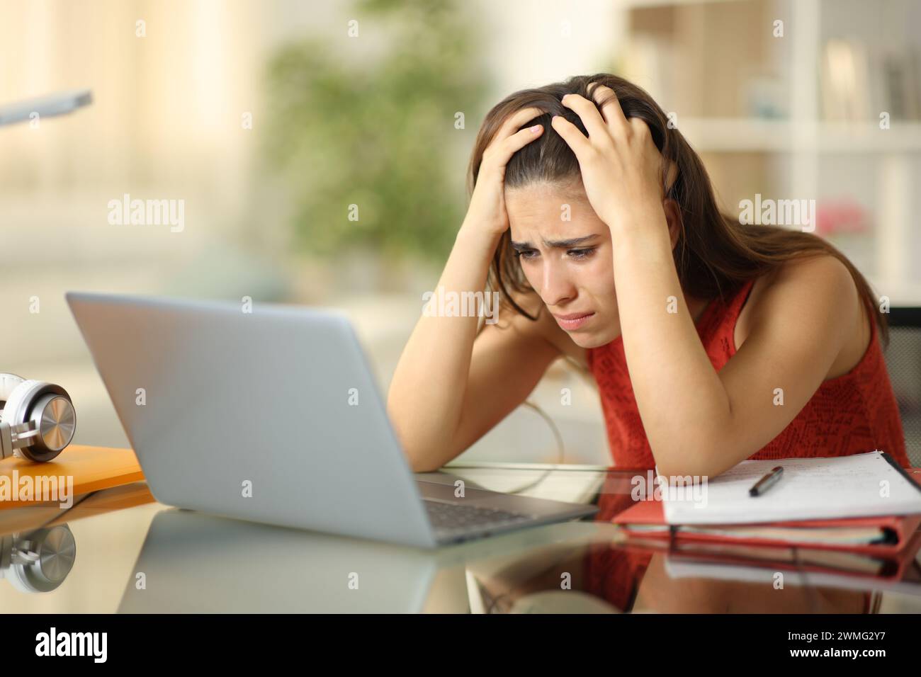 Sad teenager laptop hi-res stock photography and images - Alamy