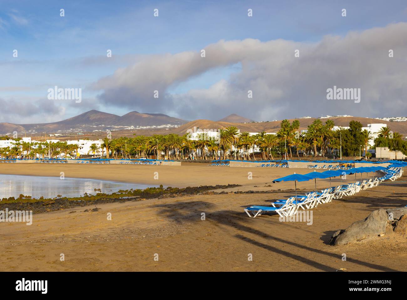 Very early morning on the beach in Puerto del Carmen Stock Photo - Alamy