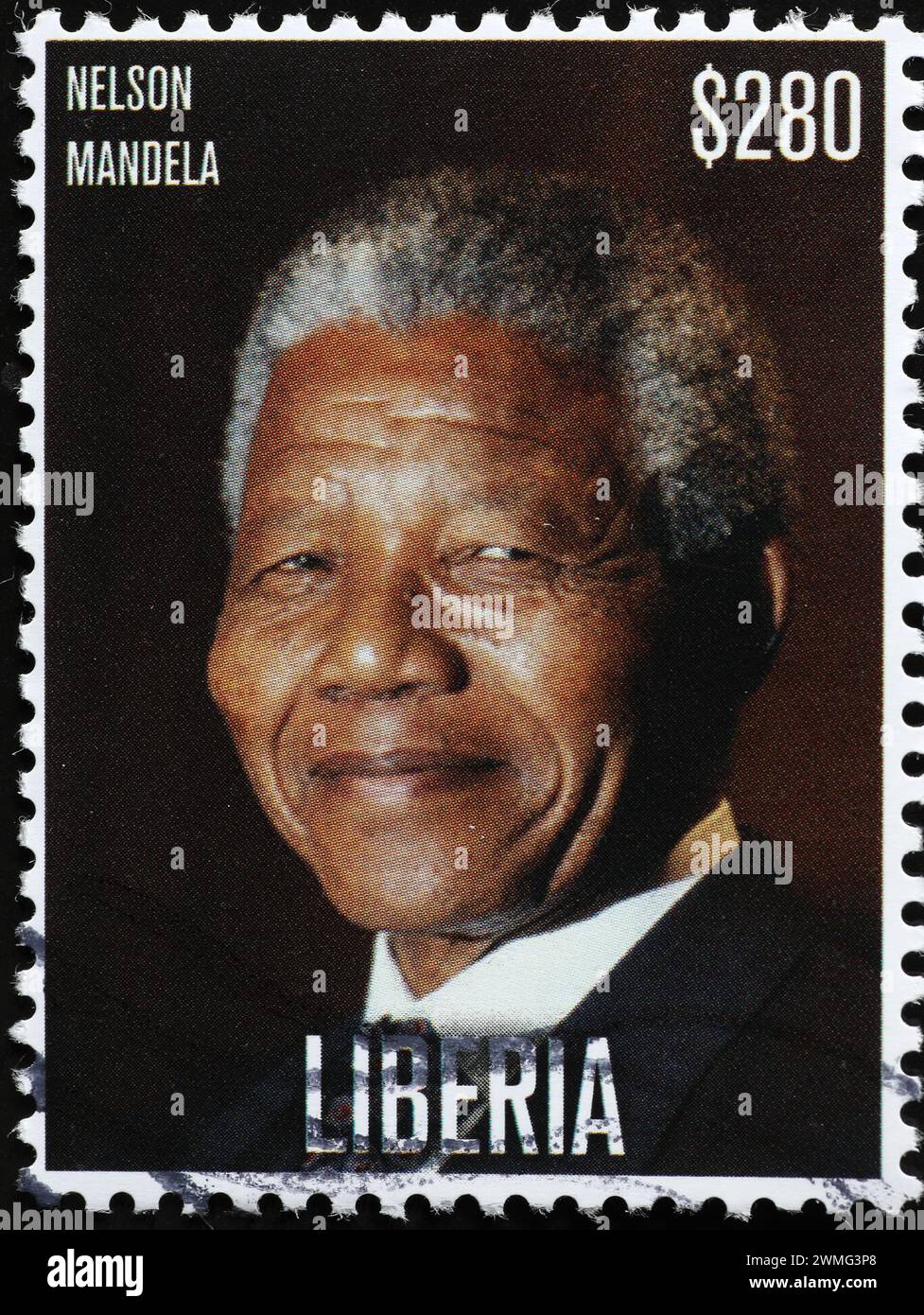 Nelson Mandela smiling on postage stamp of Liberia Stock Photo - Alamy