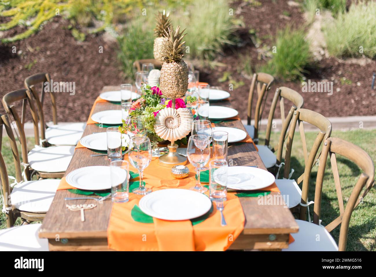 Tropical Theme Table Setting with Pineapple Centerpieces and Shells ...