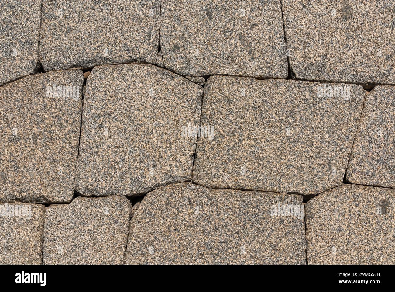 Ancient japanese stone wall made of rocks as background Stock Photo - Alamy