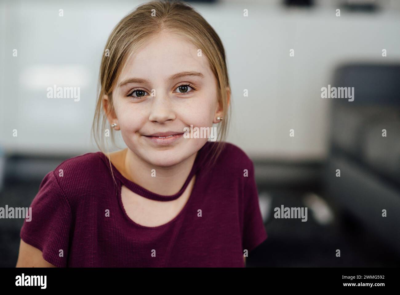 Close up portrait of preteen girl looking at camera and smiling Stock ...