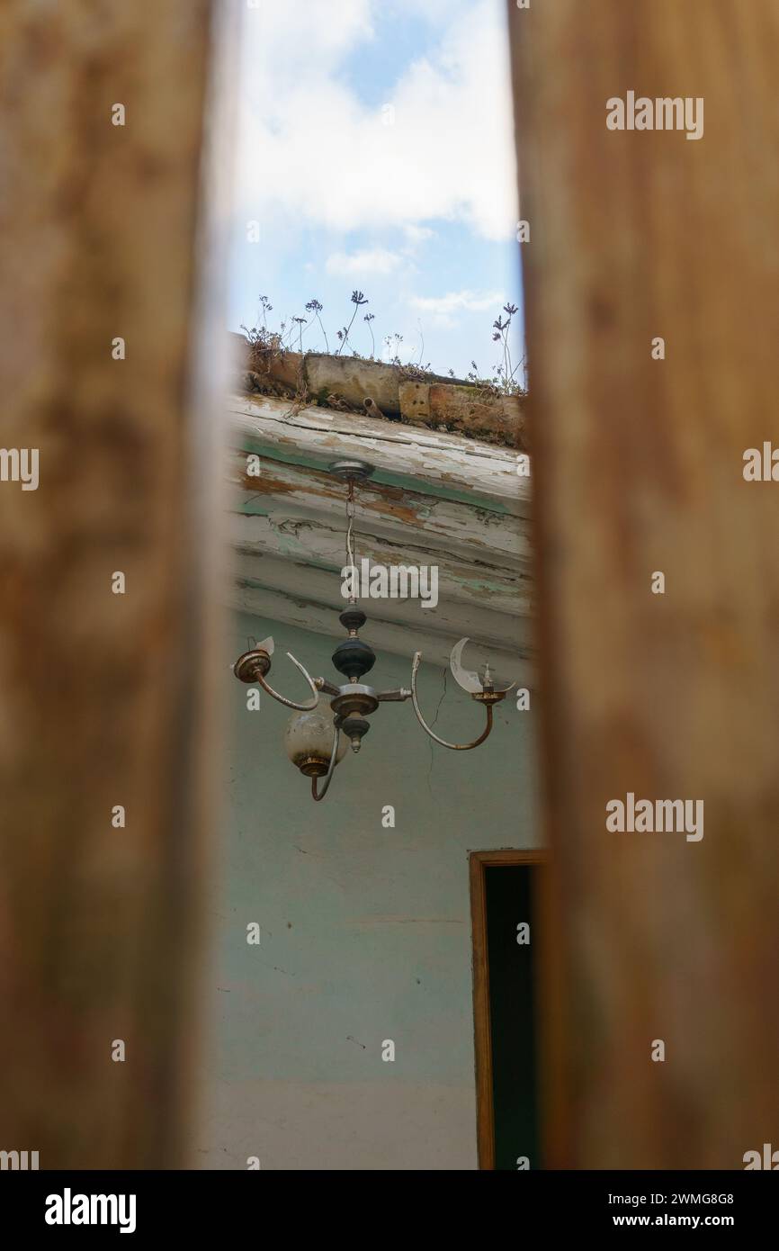 Hanging broken light bulb in hi-res stock photography and images - Alamy