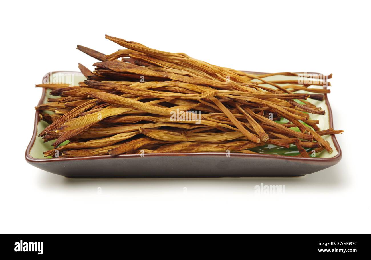 Dried Lily Buds on white background Stock Photo - Alamy