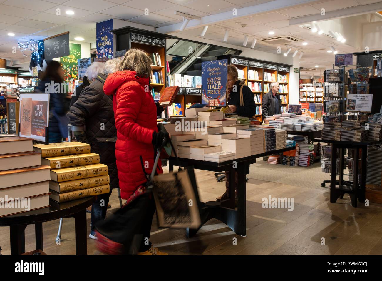 Shoppers browsing inside a Waterstones bookshop in the UK Stock Photo ...
