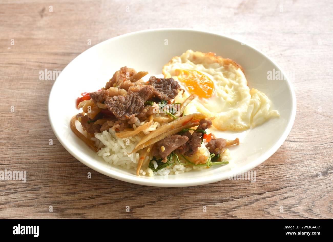 spicy stir fried bamboo shoot and slice beef meat with basil leaf ...