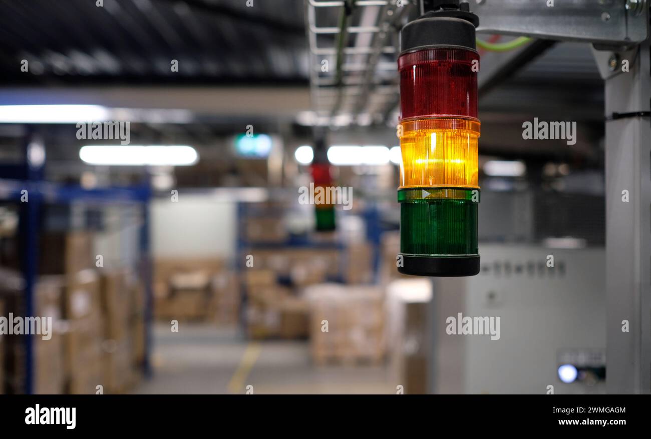 Yellow warning light inside a warehouse and distribution center Stock ...
