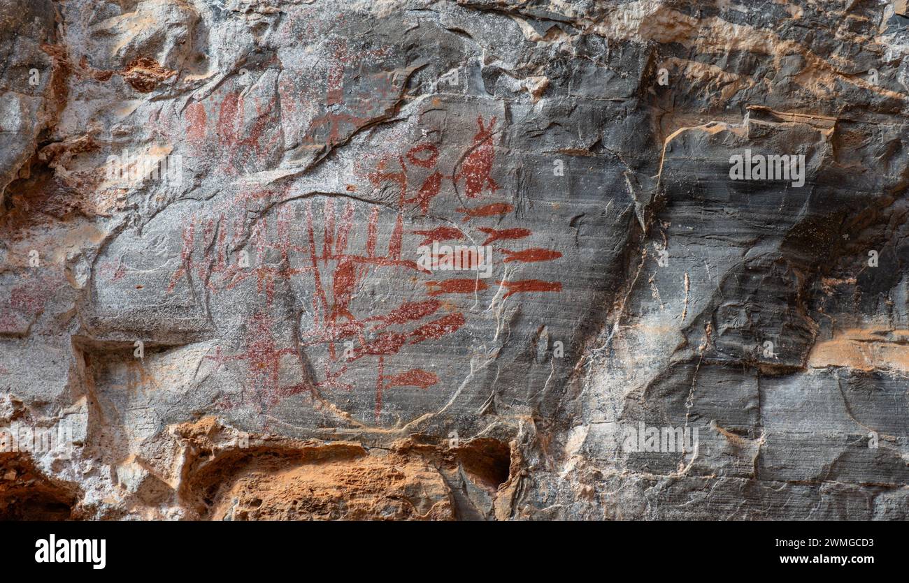 Ancient Rock Art Depicting Tribal Life and Animals Stock Photo - Alamy