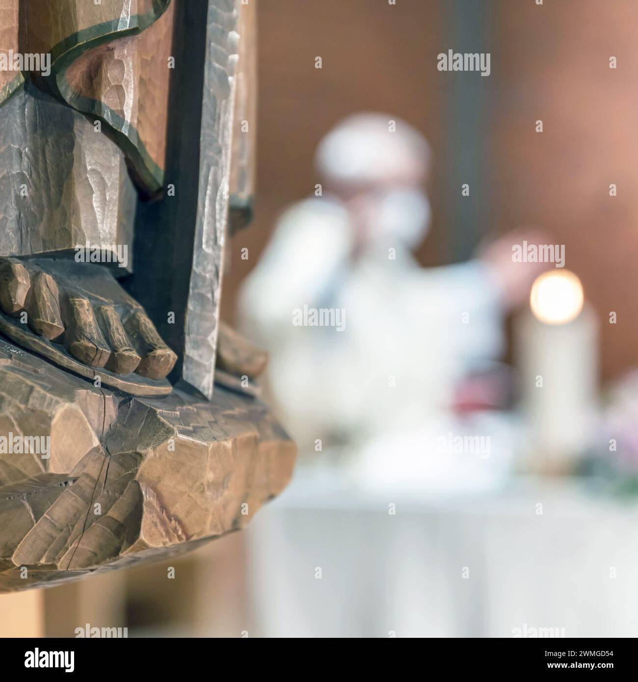 Holy wooden statue. Carved wooden feet, detail of wooden statue of a ...