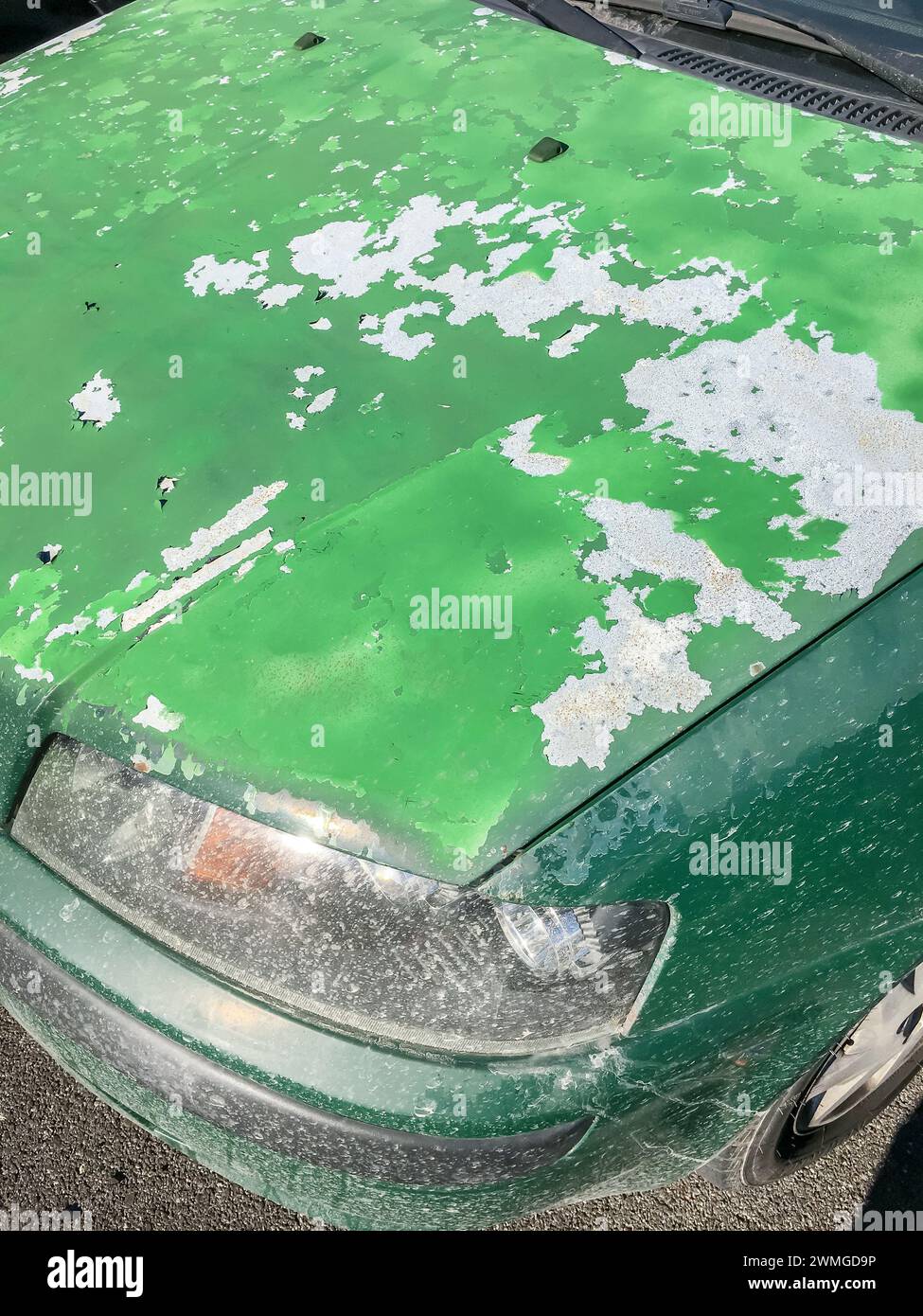 Cracked and peeling paint on an old car for background Stock Photo - Alamy