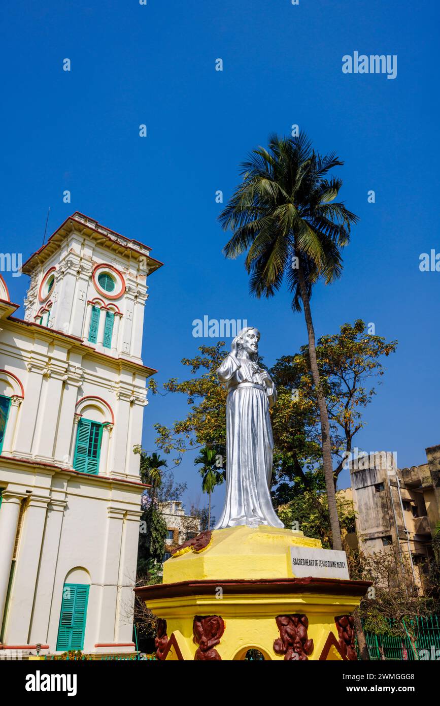Statue of Jesus outside Sacred Heart Church, a Catholic church founded ...