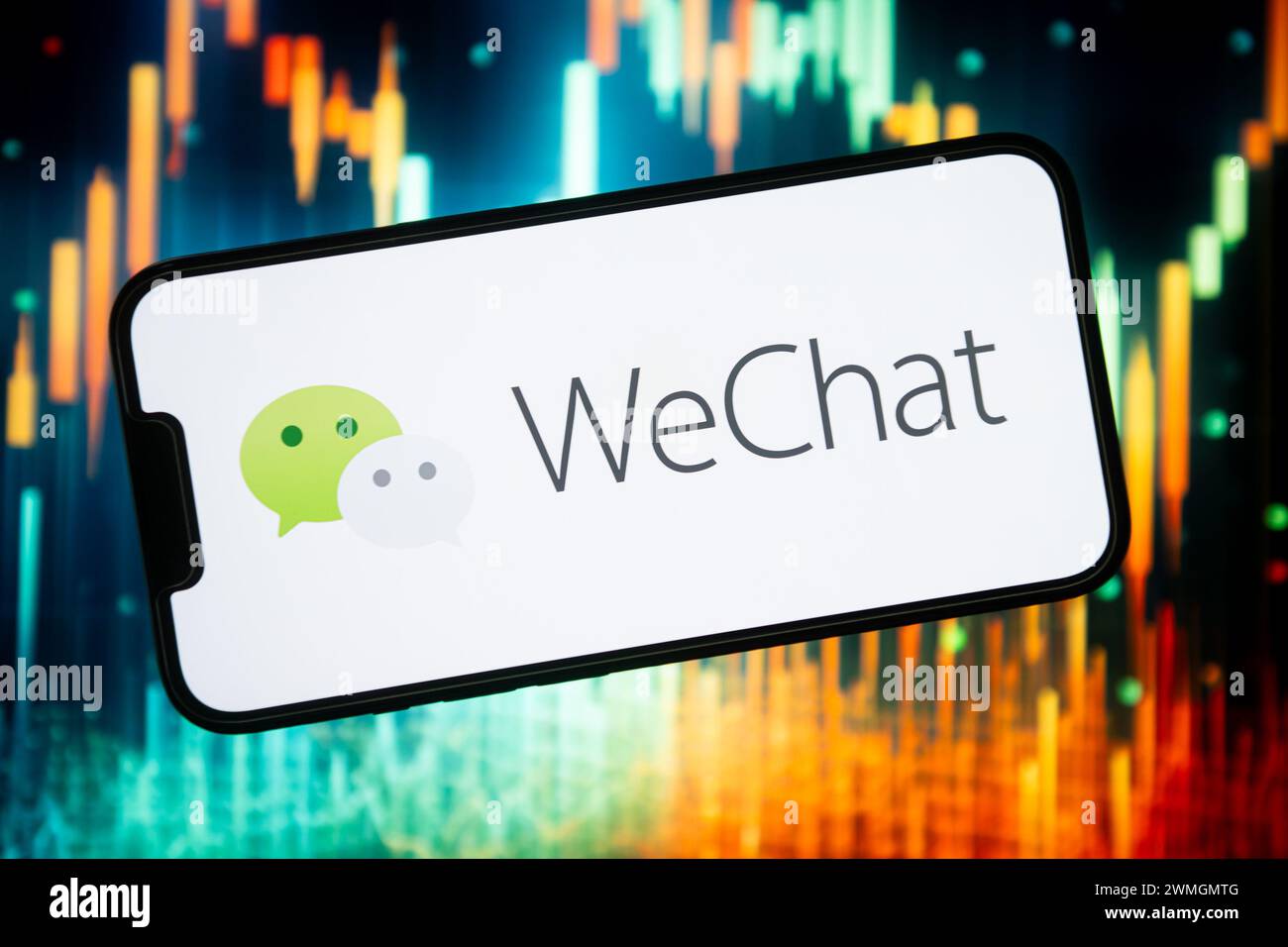 In this photo illustration a WeChat logo seen displayed on a smartphone ...