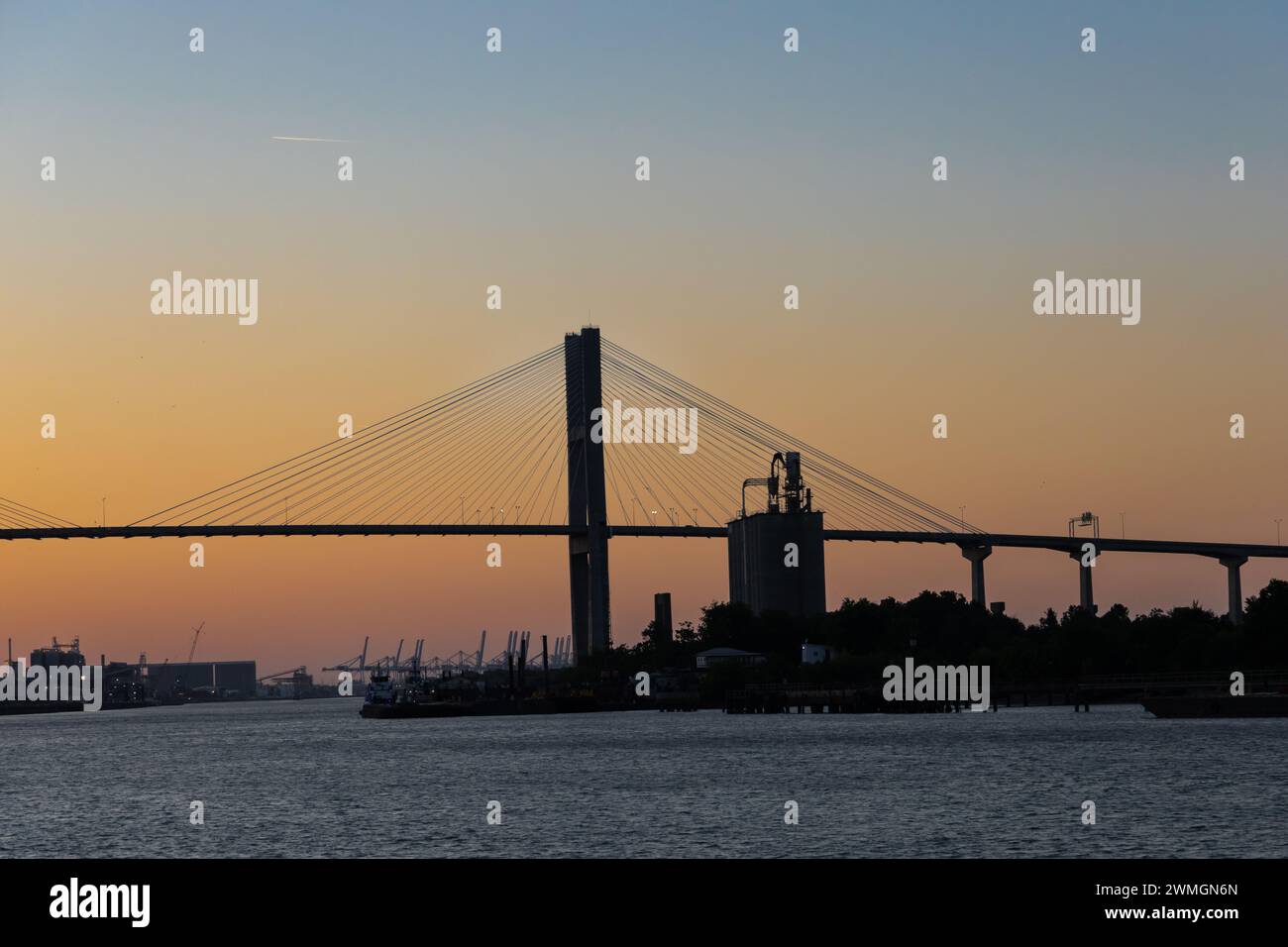 The Savannah Georgia Talmadge bridge silhouette at sunset from a ...