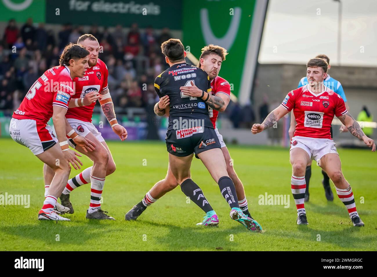 Joe Sharrocks making a tackle on the castleford player. Salford Red Devils Vs Castleford Tigers ...