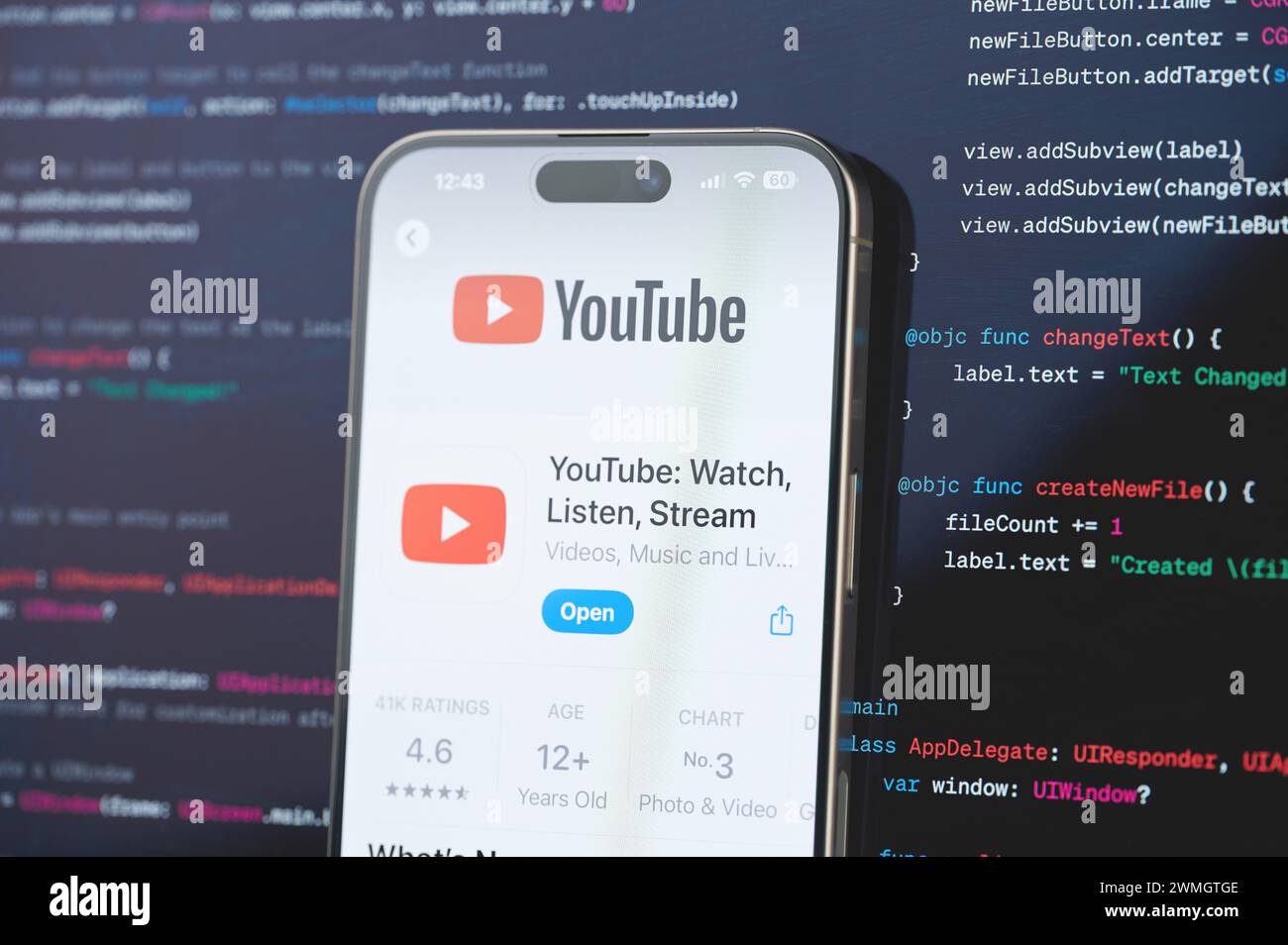 New York, USA - February 23, 2024: Youtube on iphone screen in blurred ...