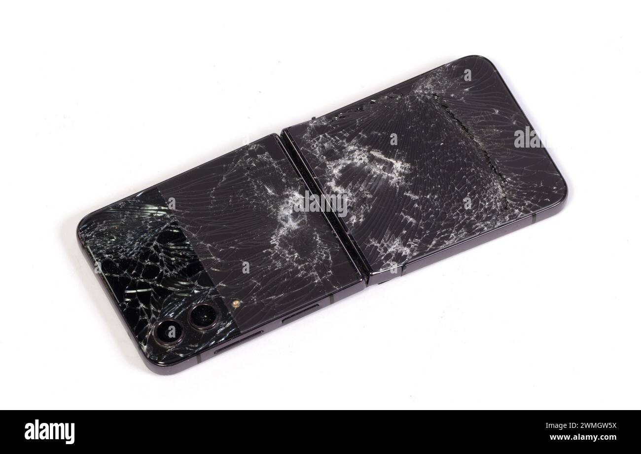 Broken display screen foldable smartphone on a white background Stock ...