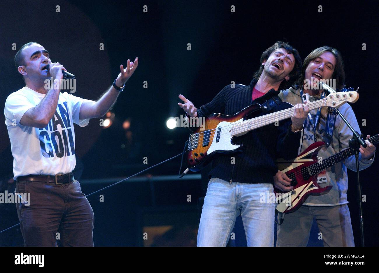 Milan Italy 2003-12-15: The bassist Faso, the singer Elio and the ...