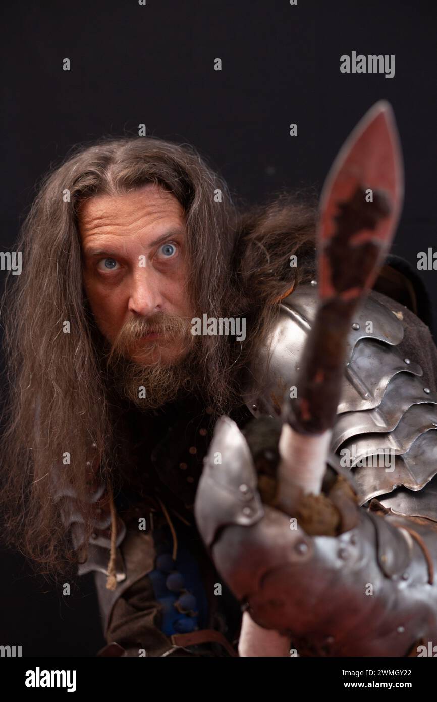 Vertical composition. Portrait of a medieval knight with a ...