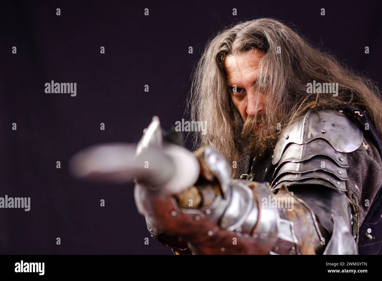 Performance for tourists. Portrait of a charismatic man dressed as a ...