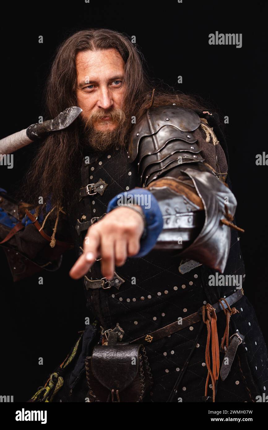 Vertical composition. The concentrated gaze and tense posture of a ...