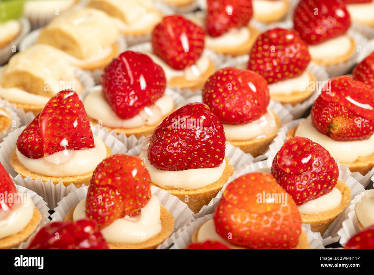 Tartlet types. Pastry product. Tartlets with kiwi, banana and ...