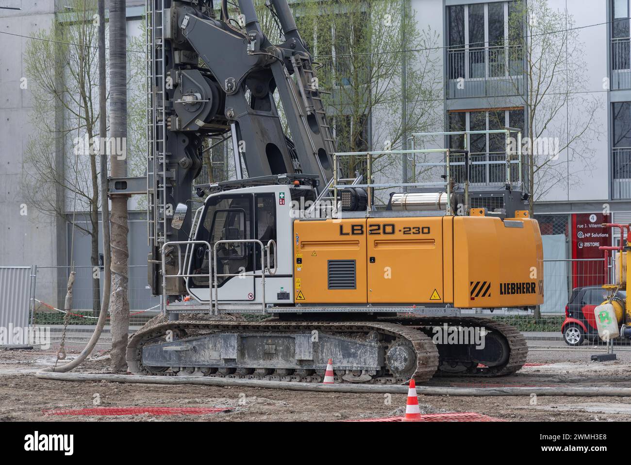 Nancy, France - Focus on a yellow drilling rig Liebherr LB 20 for special foundations on ...