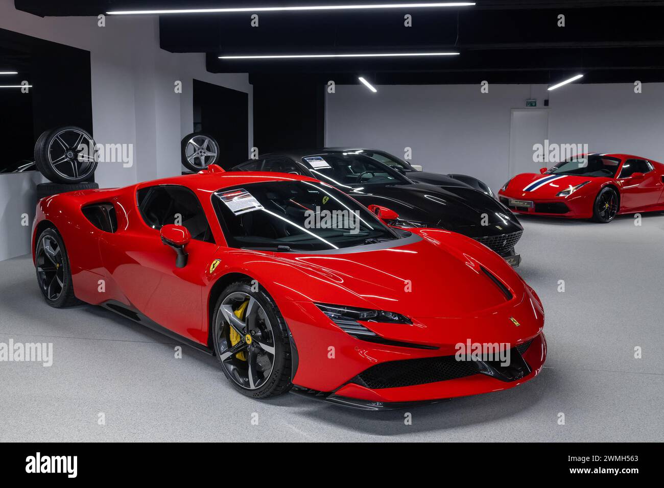 Luxembourg City, Luxembourg - Focus on a red Ferrari SF90 Stradale in a ...