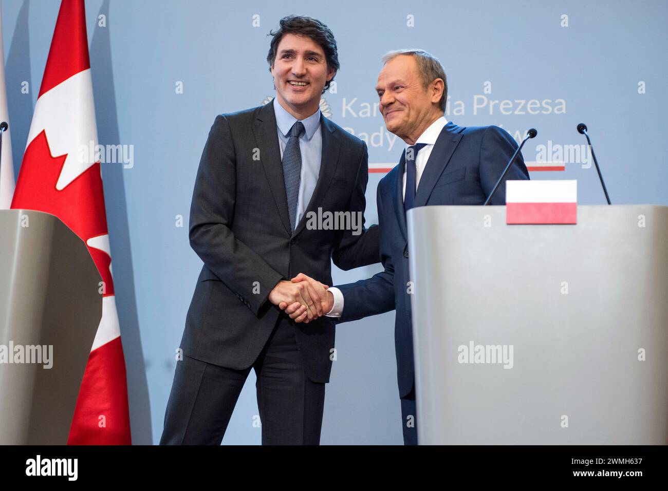 Canada's prime minister Justin Trudeau (L) and PM Donald Tusk (R) shake ...